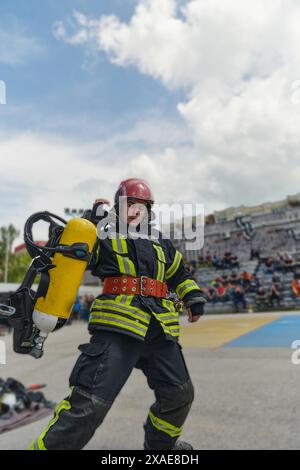 A firefighter dons the essential components of their professional gear ...