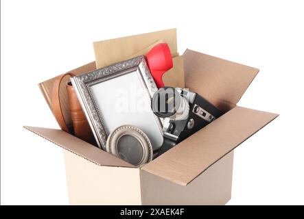 Box of unwanted stuff isolated on white Stock Photo - Alamy