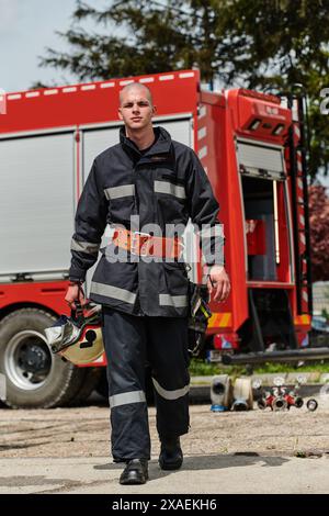 Firefighter Stands Proudly with Professional Gear Beside Fire Truck ...