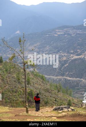 Bhutanese woman hiking in the mountain, Paro, Drakarpo, Bhutan Stock ...