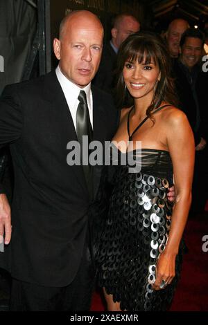 Bruce Willis and Halle Berry attend the premiere of "Perfect Strangers ...