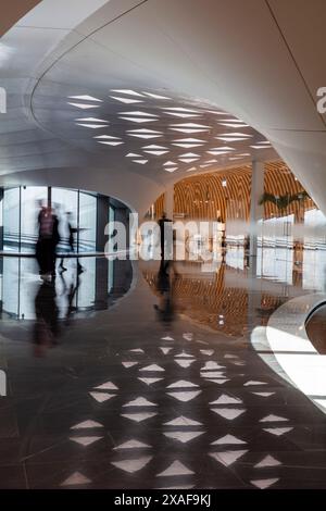 People standing in the main reception area. BEEAH Headquarters, Sharjah ...