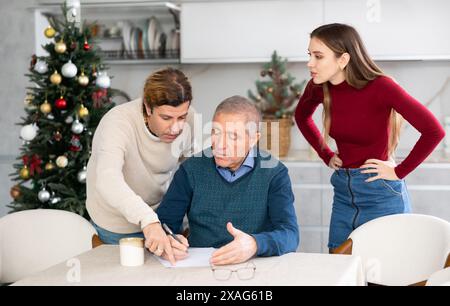 Family members discussing inheritance Stock Photo - Alamy