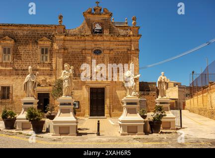 Saint Augustine convent with statues at the entrance in Victoria. Gozo ...