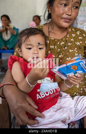 A mother and a year-old daughter at Samudayik Swastha Ikai, a Community ...