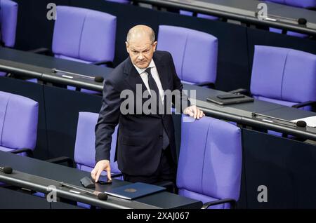 Federal Chancellor Olaf Scholz arrives at a session of the Bundestag to ...