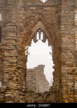 Thick sea Fog surrounds the ruins of Whitby Abbey, creating a haunting ...
