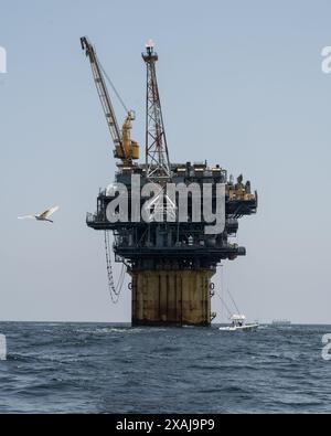 A large offshore floating oil platform operates in the Gulf of Mexico ...