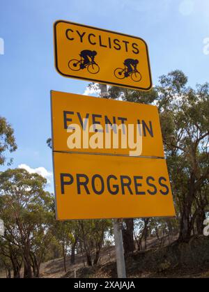 A Caution Cycle Event in Progress sign at a zebra crossing Stock Photo ...