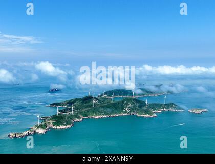 ZHOUSHAN, CHINA - JUNE 8, 2024 - A wind farm is seen on Luhua Island in ...