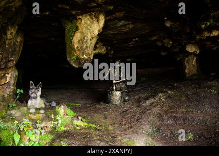 Archaic humans Neanderthal antique statue in stone cave underwater ...