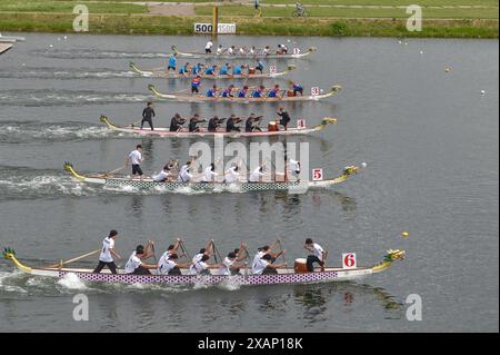 Teams compete during the 7th Dragon Boat Race on the ancient Bianhe ...