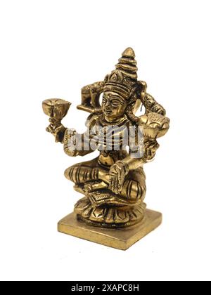 hindu goddess lakshmi with multiple hands blessing in a sitting ...
