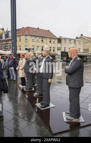 Statues, figures of everyday people in the city of Valkenburg ...