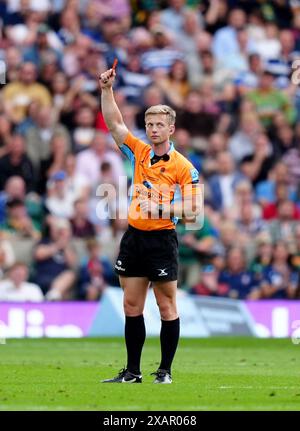 Referee Christophe Ridley shows Bath Rugby's Beno Obano (not pictured ...