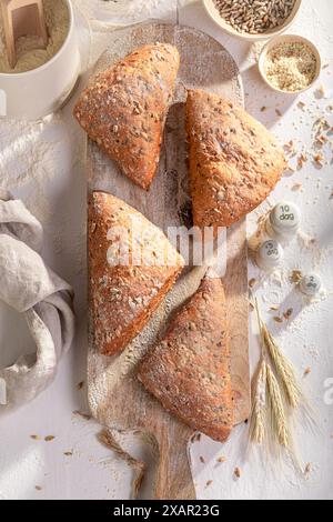 Homemade and tasty triangular rolls baked in the bakery. Triangular ...