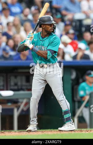 Seattle Mariners second baseman Ryan Bliss dives in vain for a single ...