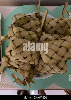 Photo of puso , tamu, also known in Philippine English as hanging rice ...