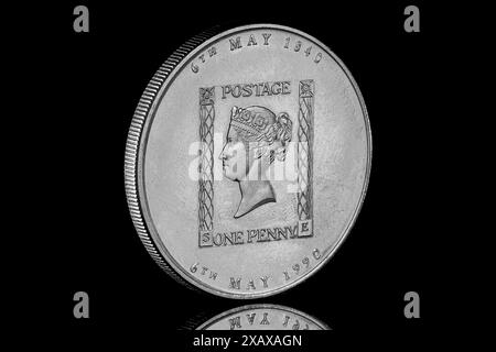 A coin issued to staff, to commemorate the company's New Identity of ...