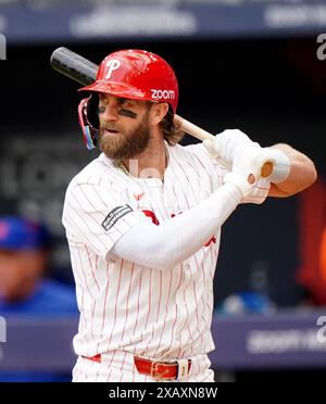 Philadelphia Phillies' Bryce Harper bats as Andrew Knapp catches during ...