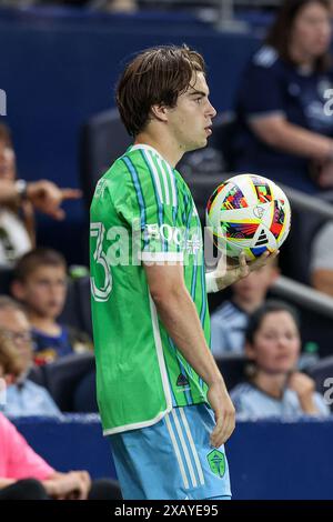 Seattle Sounders FC defender Cody Baker (33) laughs with midfielder Obed Vargas (18) as Inter ...