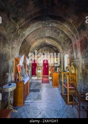 Interior of historic small single-nave church Panagia Throniotissa Naos Panagia of Dormition of ...