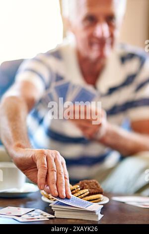 Man picking a playing card Stock Photo - Alamy