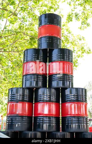 Stack of drums with black and red stripes. Mock up Stock Photo - Alamy
