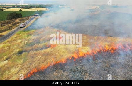 Waterford, Ca, USA. 8th June, 2024. Firefighters work on a progressive ...