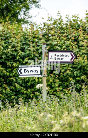 Directional Byway and Restricted Byway signage on a rusty metal post in ...