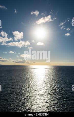 Sunset over the sea. Reflection of sunlight in the sea waves. Red sky ...