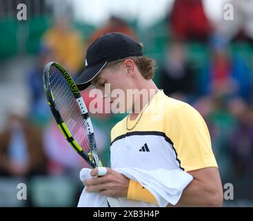 Henry Searle during his match against Ethan Quinn on day one of the ...
