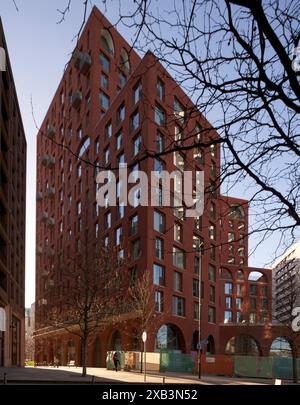 Red brick facade and arches of ground level. Cadence - King's Cross ...