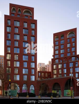Red brick facade and arches of ground level. Cadence - King's Cross ...