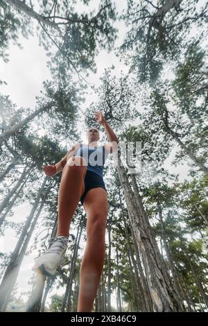 Adventurous Woman Overcoming Forest Obstacles with Determination and ...