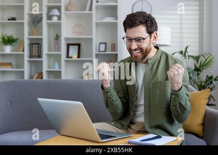man with yes gesture in front of a computer Stock Photo - Alamy
