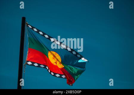 Flag of the original Mapuche people in blue sky Stock Photo - Alamy