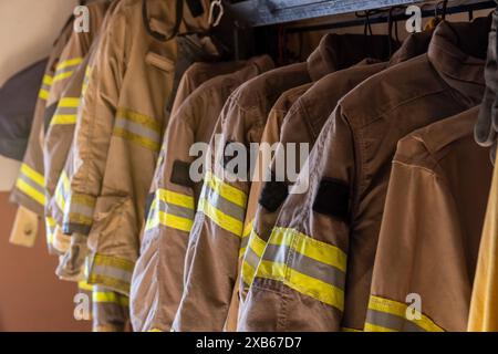 Firefighters coat rack Stock Photo - Alamy