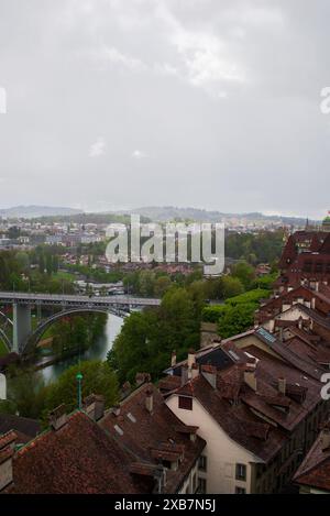 Bern Old Town skyline along Aare River with the distinctive spire of ...