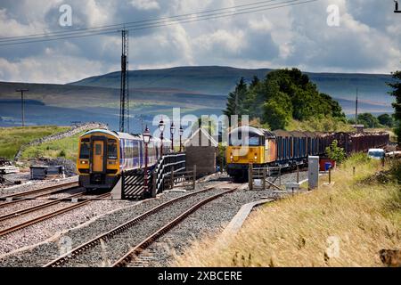 Northern Rail class 158 and Colas Rail Freight class 56 locomotive with ...