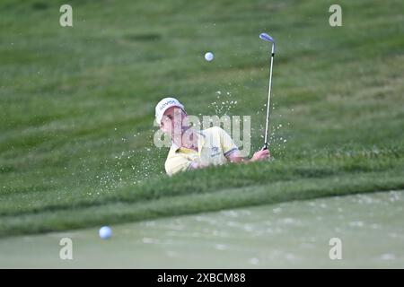 Denny McCarthy hits out of bunker on the 17th hole during the third ...