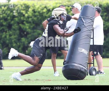 New Orleans Saints linebacker Jaylan Ford talks to reporters after an ...