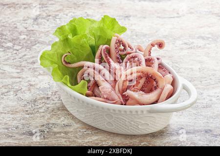 Marinated squid tentacles in the bowl for snack or salad Stock Photo ...