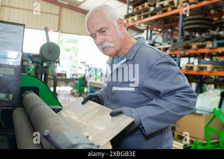 experienced man is laboring with concentration Stock Photo - Alamy
