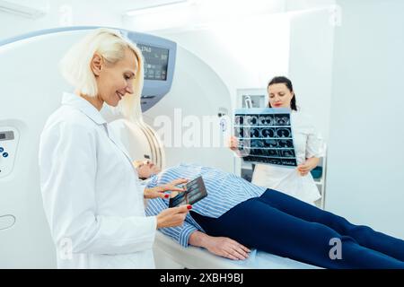 The doctor examining x-ray images of patient Stock Photo - Alamy