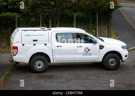 Kelly Communications white van parked in a street Stock Photo - Alamy