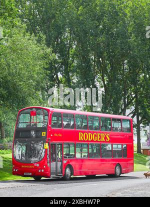 Rodger's double decker red bus parked outside the international ...