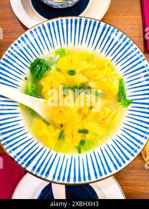 Asian traditional Wonton soup with herbs and spices Stock Photo - Alamy