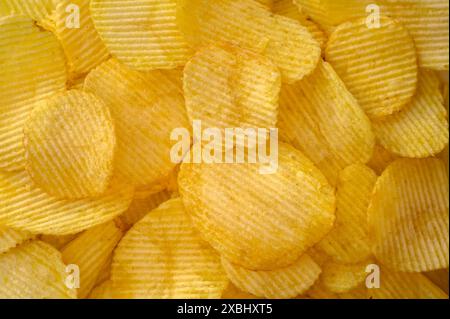 Full frame foodbackground of potato chips, top view 1 Stock Photo - Alamy