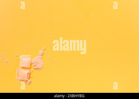 Contents of powder in a snus bag on a yellow background Stock Photo - Alamy